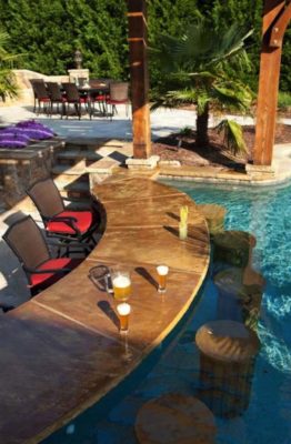 33 Mega-Impressive swim-up pool bars built for entertaining