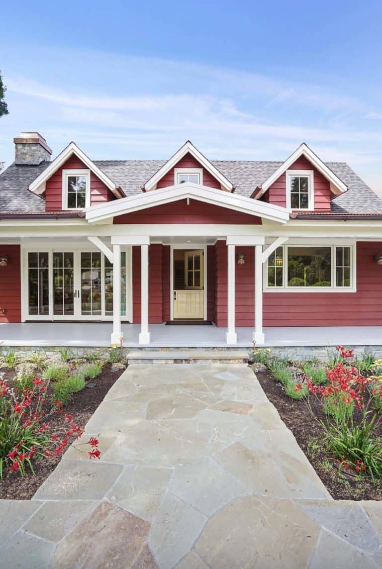 Step into this beyond stunning red farmhouse home in Northern California