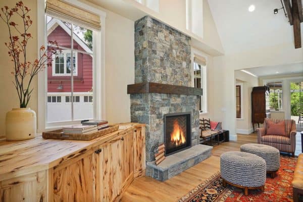 Step into this beyond stunning red farmhouse home in Northern California