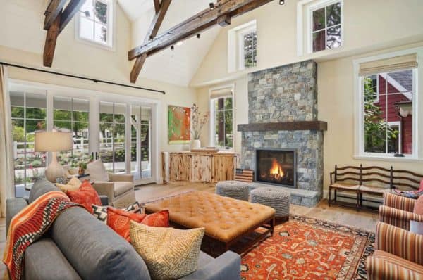 Step into this beyond stunning red farmhouse home in Northern California