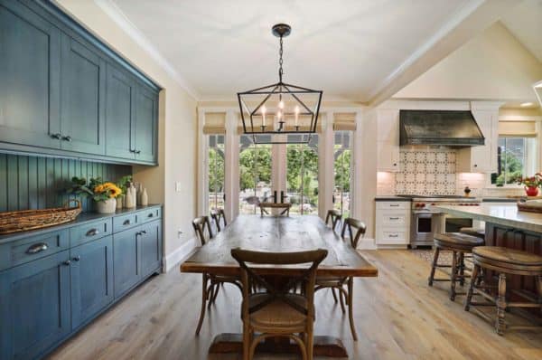 Step into this beyond stunning red farmhouse home in Northern California