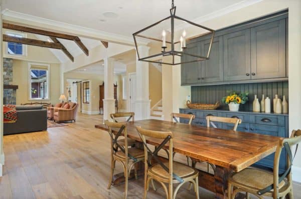 Step into this beyond stunning red farmhouse home in Northern California