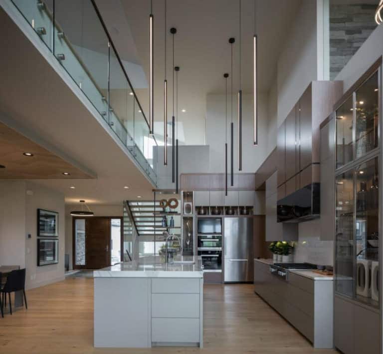 Tour this warm contemporary Calgary home with inspiring Bow River views