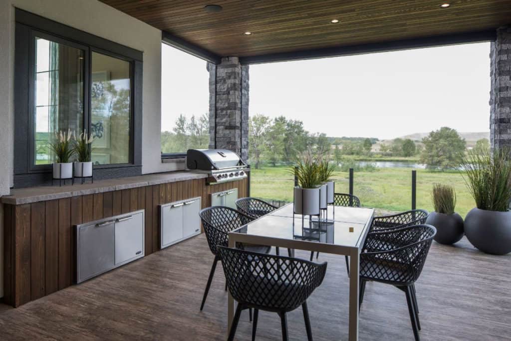 Tour this warm contemporary Calgary home with inspiring Bow River views