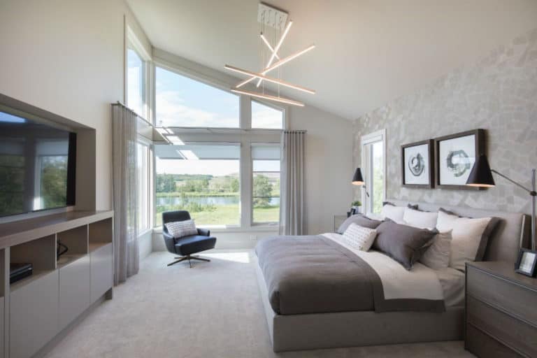 Tour this warm contemporary Calgary home with inspiring Bow River views
