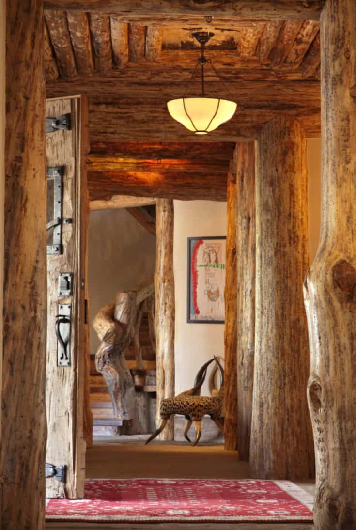 Step into this dreamy Big Sky mountain cabin with rustic luxe interiors