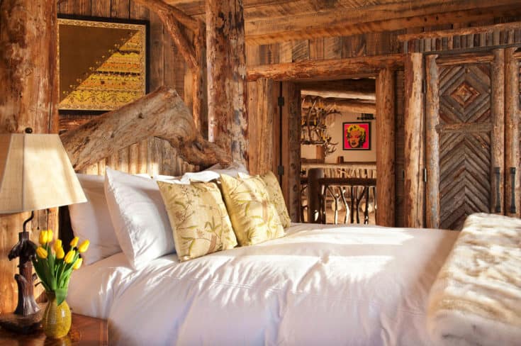 Step into this dreamy Big Sky mountain cabin with rustic luxe interiors
