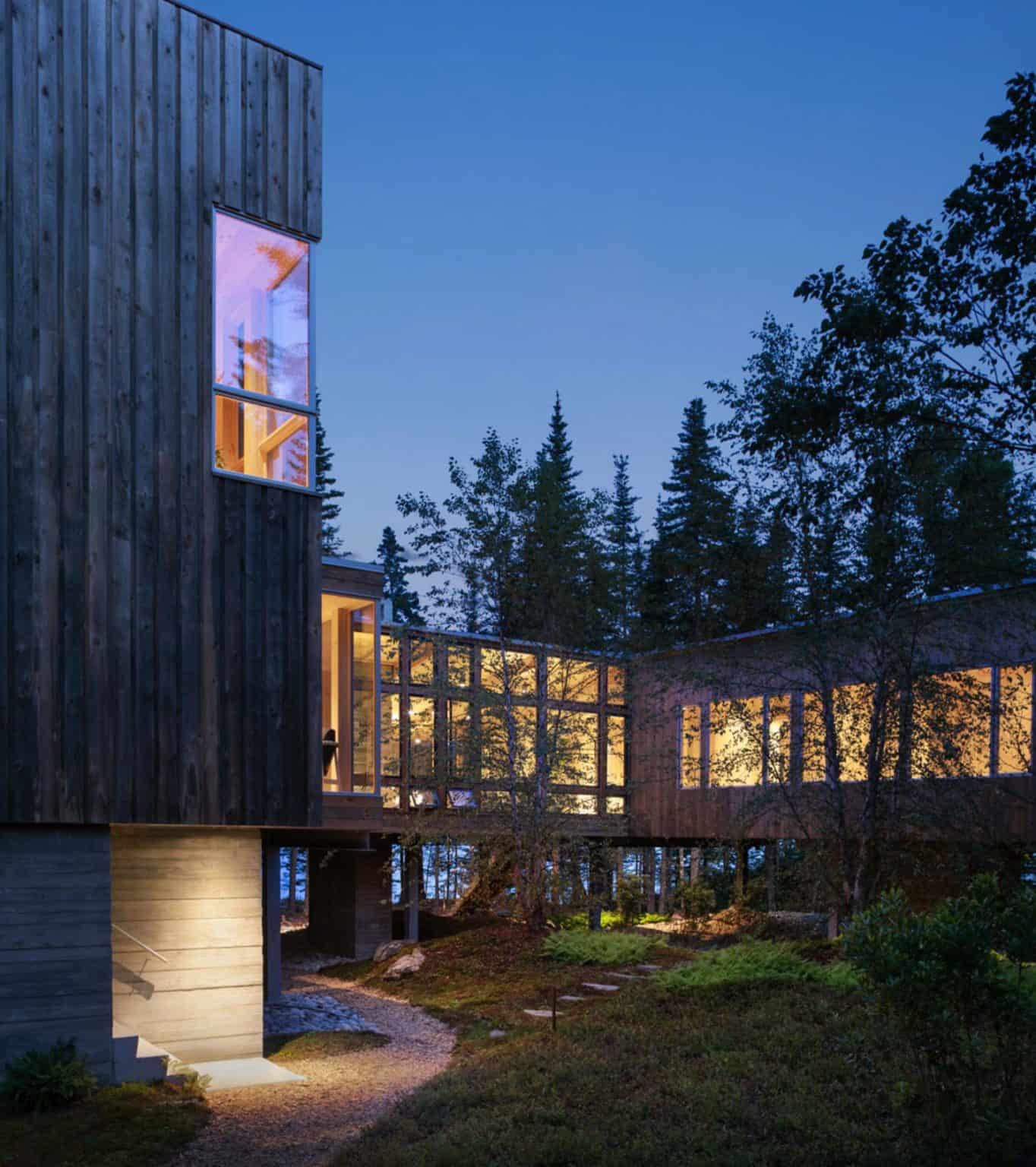 Cabin retreat designed with a rustic camp feel in coastal Maine