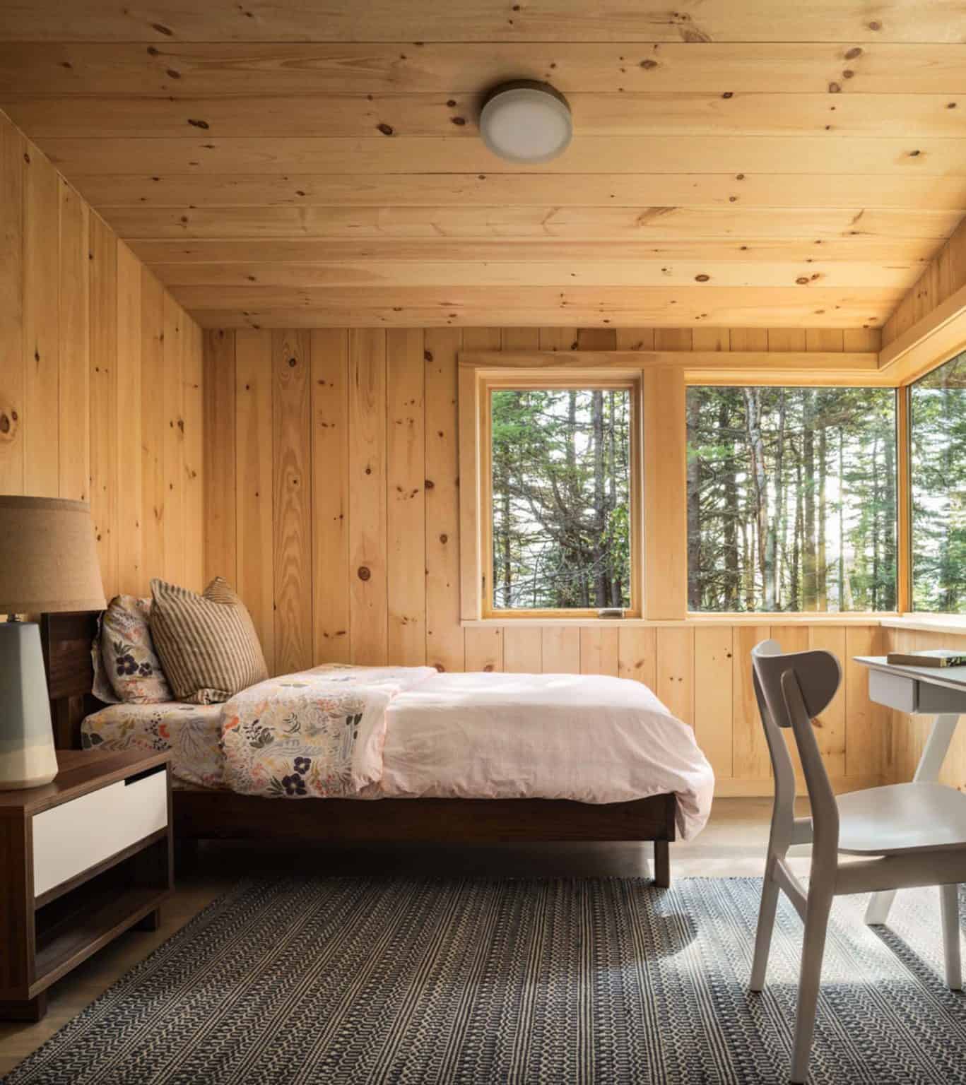 Cabin retreat designed with a rustic camp feel in coastal Maine