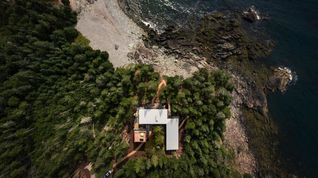 Cabin retreat designed with a rustic camp feel in coastal Maine