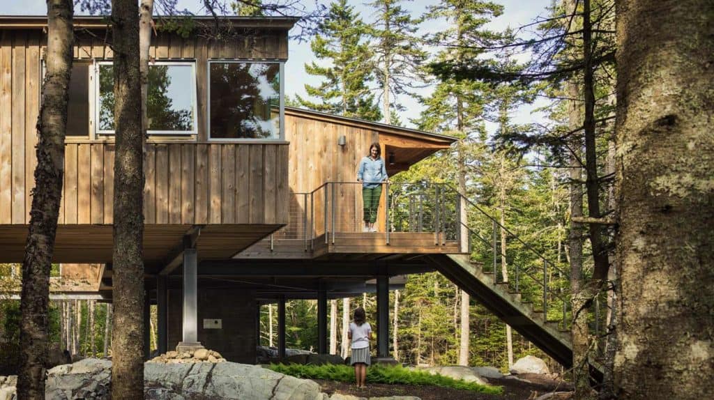 Cabin retreat designed with a rustic camp feel in coastal Maine