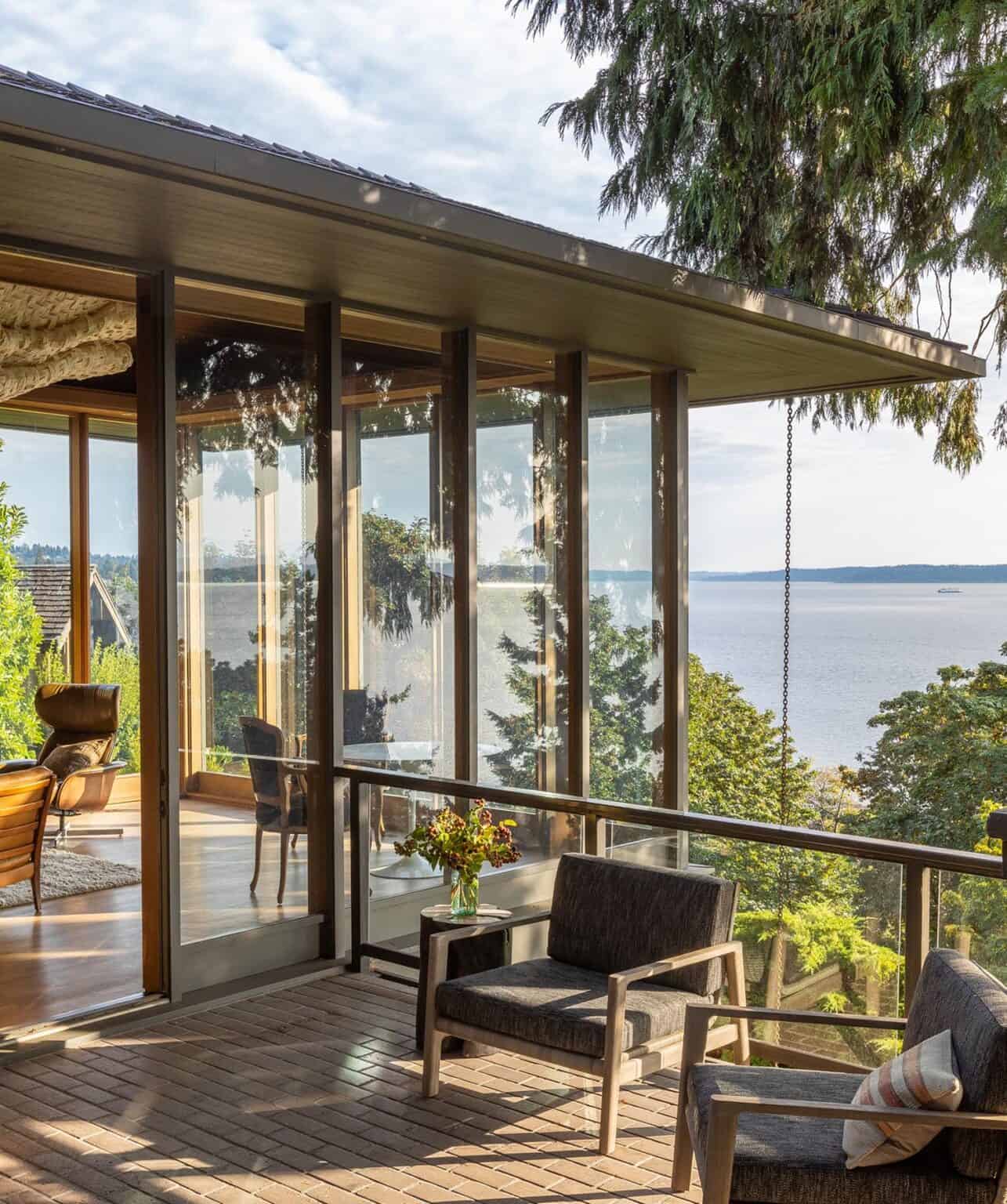 Treehouse inspired midcentury home perched on a cliffside above Puget Sound