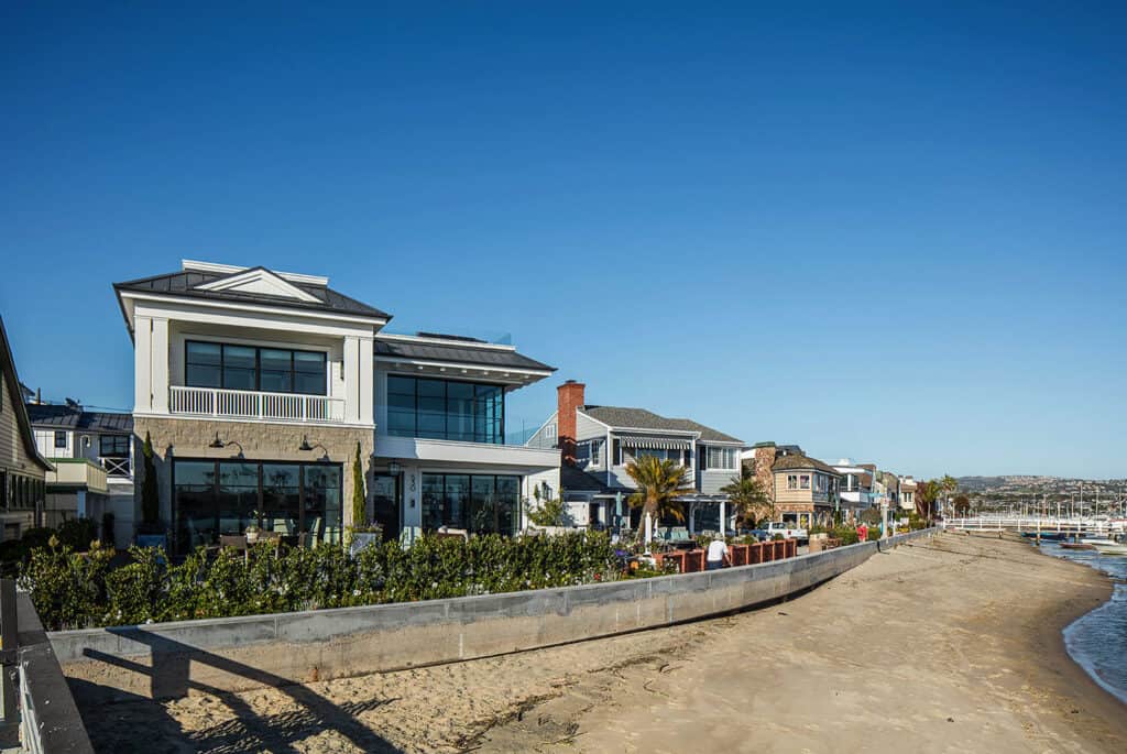 Step inside a luxurious bayfront home with coastal charm in Newport Beach