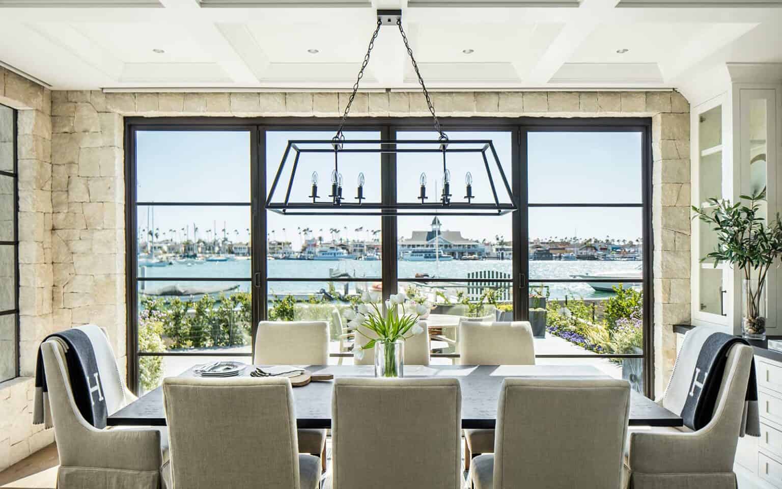 Step inside a luxurious bayfront home with coastal charm in Newport Beach