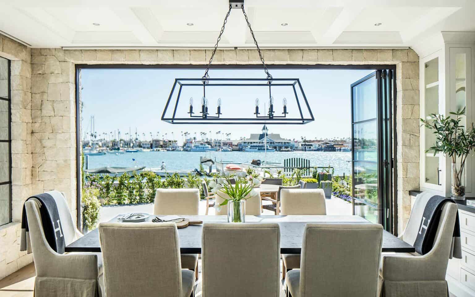 Step inside a luxurious bayfront home with coastal charm in Newport Beach