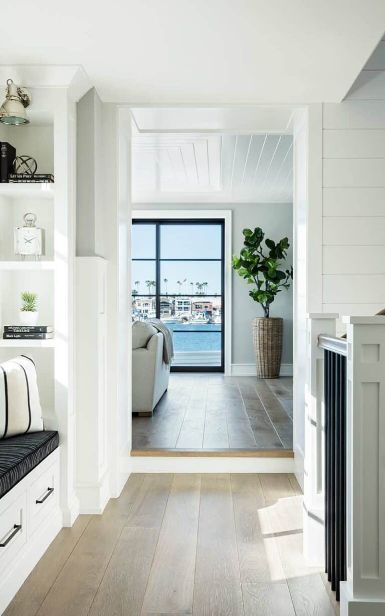 Step inside a luxurious bayfront home with coastal charm in Newport Beach
