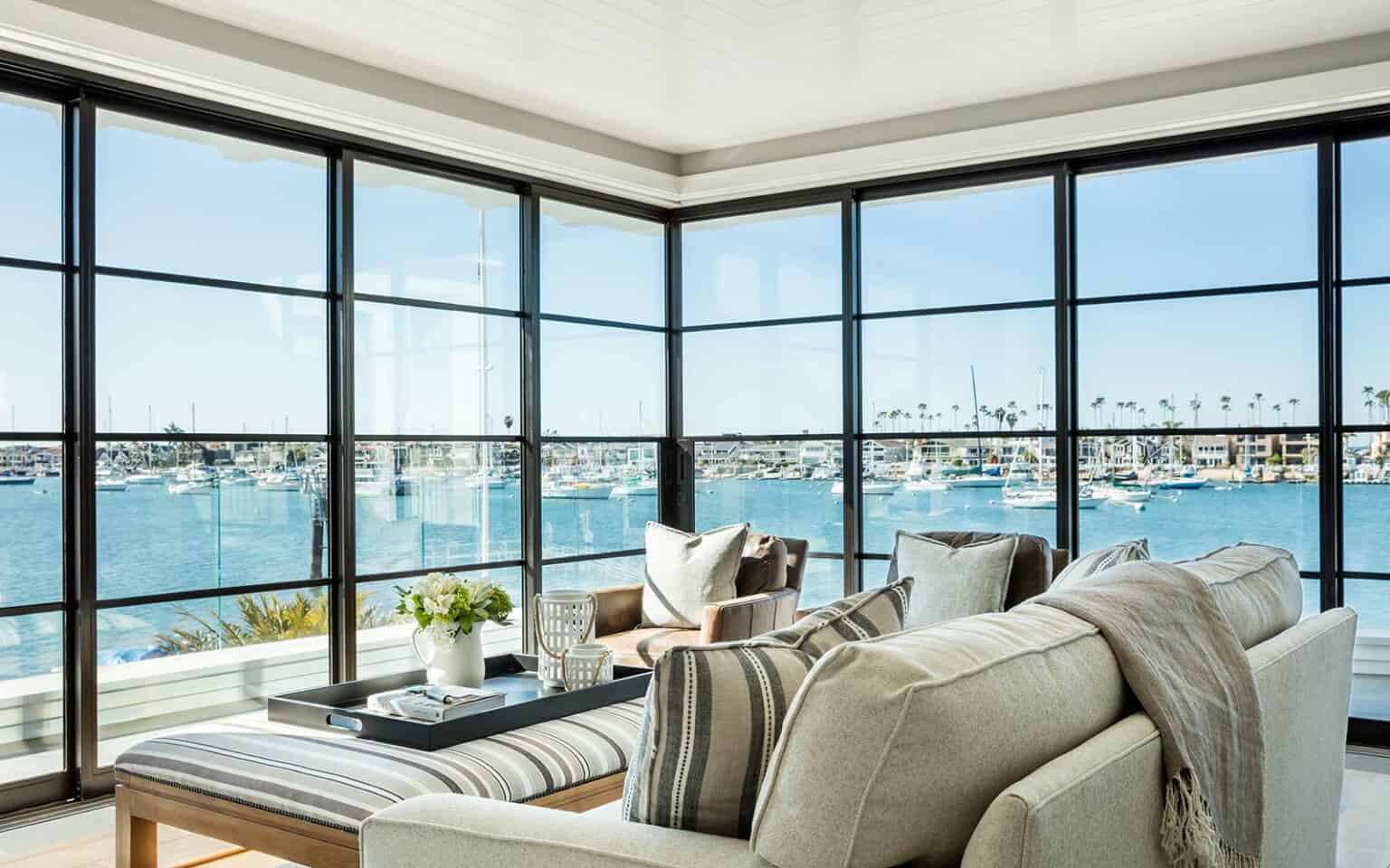 Step inside a luxurious bayfront home with coastal charm in Newport Beach