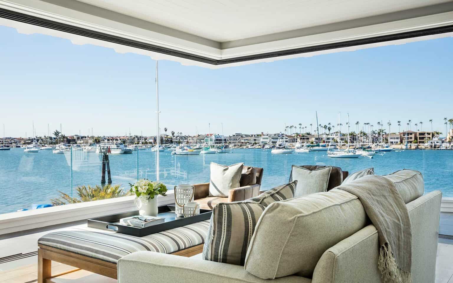 Step inside a luxurious bayfront home with coastal charm in Newport Beach