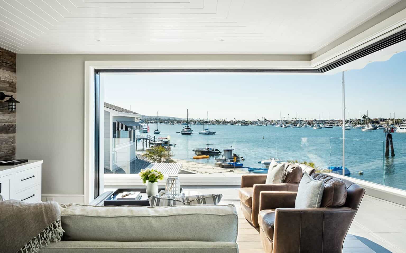 Step inside a luxurious bayfront home with coastal charm in Newport Beach