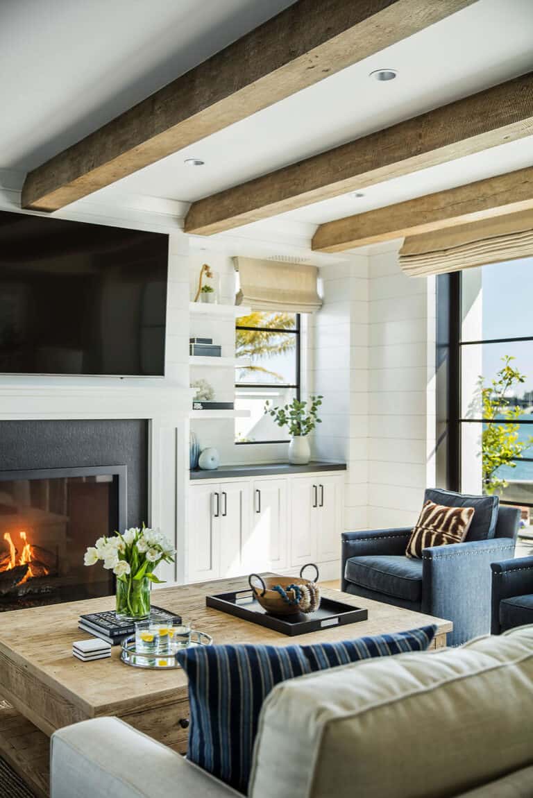 Step inside a luxurious bayfront home with coastal charm in Newport Beach