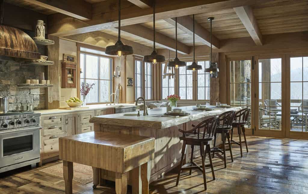 Handcrafted family home in Vermont with a backdrop of snowy peaks