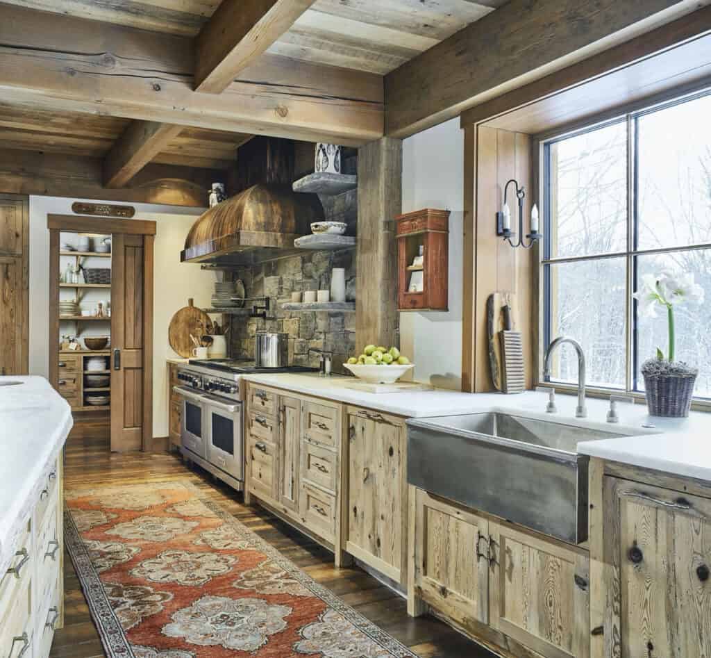 Handcrafted family home in Vermont with a backdrop of snowy peaks