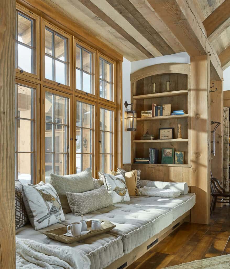 Handcrafted family home in Vermont with a backdrop of snowy peaks