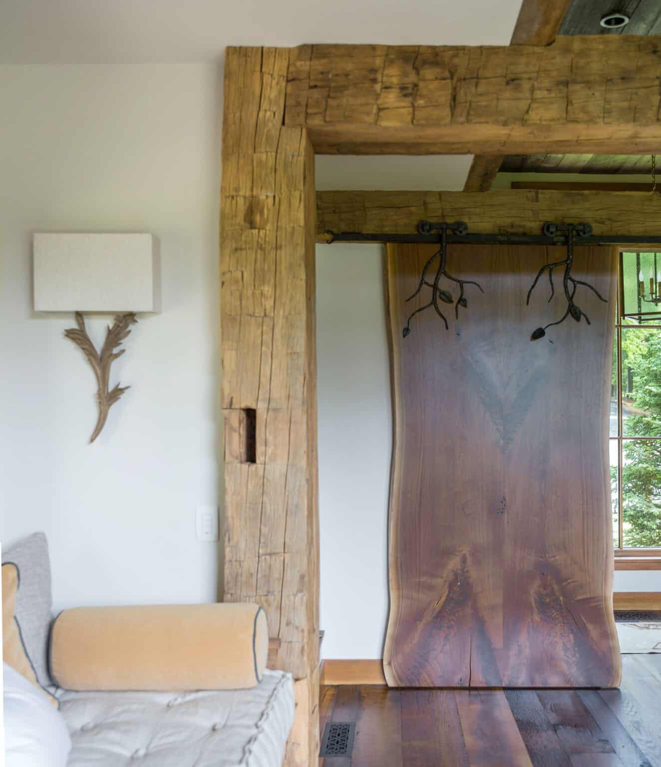 Handcrafted family home in Vermont with a backdrop of snowy peaks