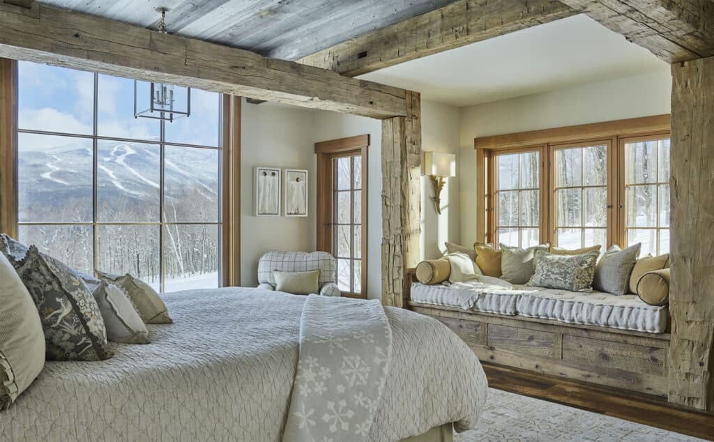 Handcrafted family home in Vermont with a backdrop of snowy peaks