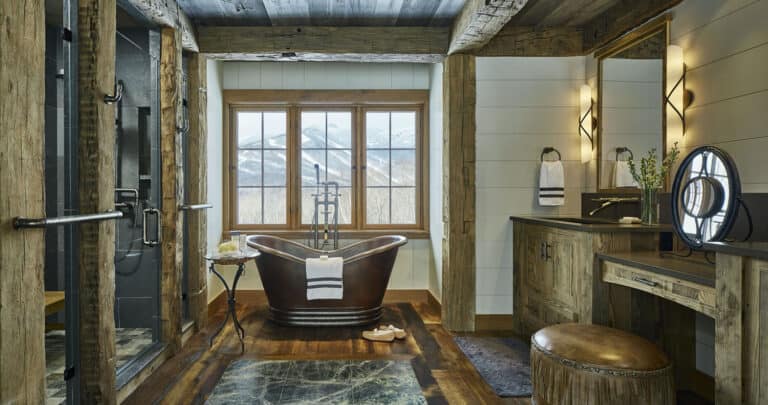 Handcrafted family home in Vermont with a backdrop of snowy peaks