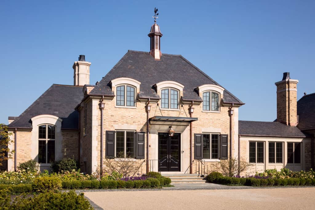 Tour this absolutely dreamy French Normandy lake house in Wisconsin