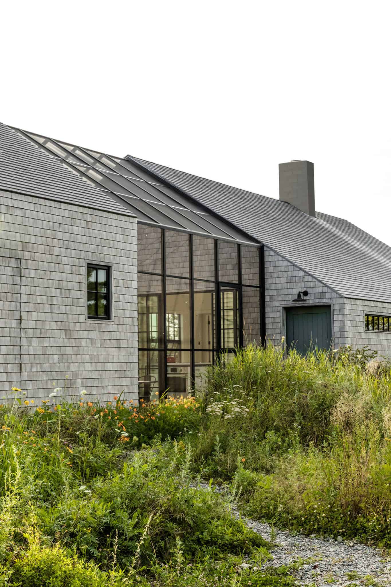 Contemporary reinterpretation of the New England connected farmhouse
