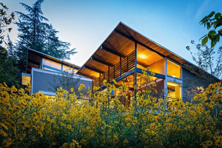 A butterfly roof shelters this modernist LEED Platinum home in Georgia