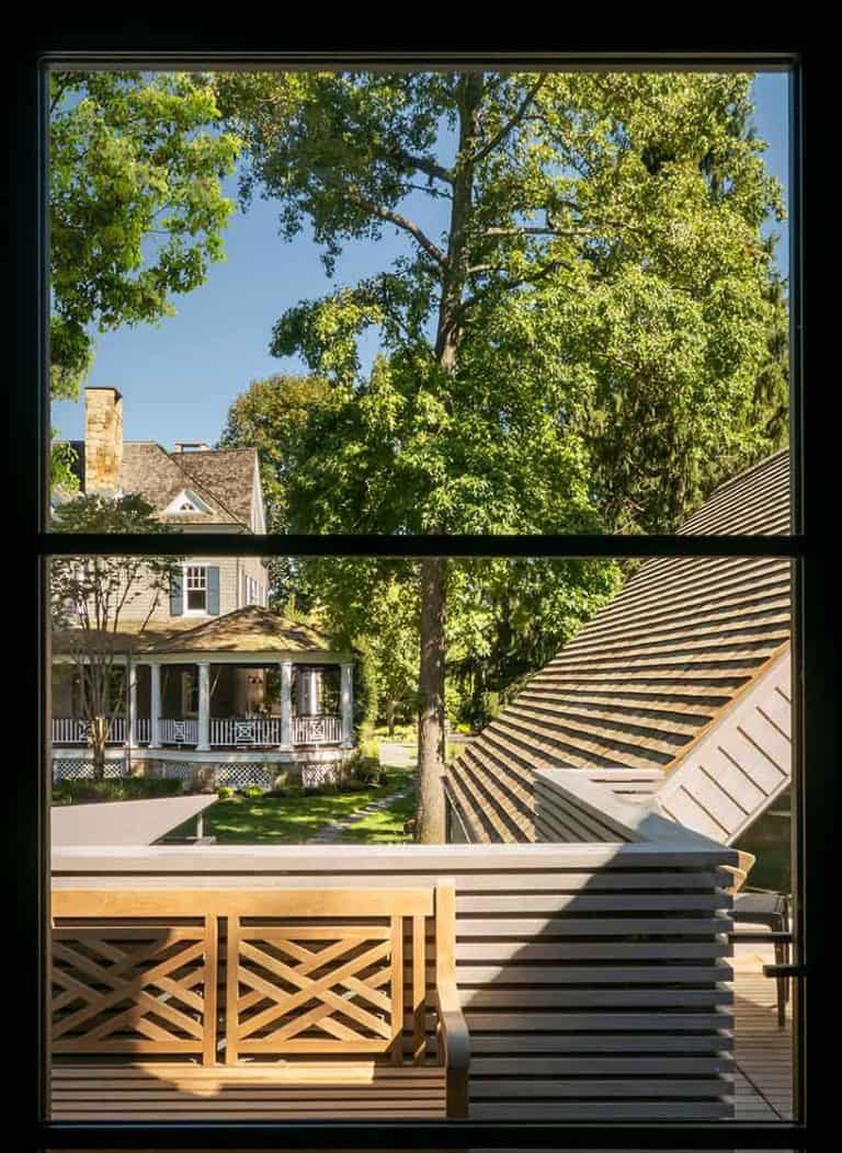 Quaint shingle style cottage in New York receives a stunning makeover