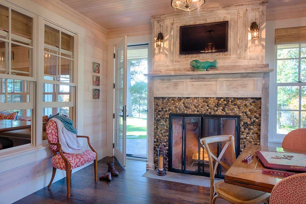 Dreamy coastal cottage enjoys a tranquil lakeside setting in the Midwest