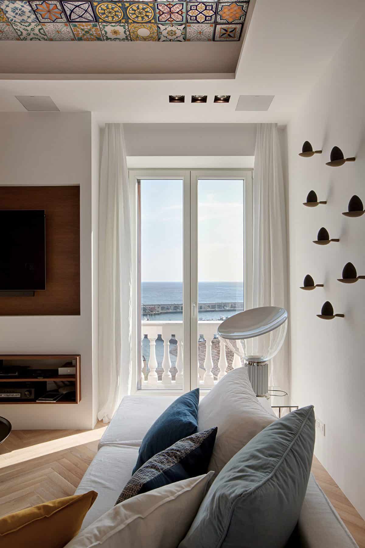 A romantic luxury apartment overlooks the rugged Amalfi Coast in Italy