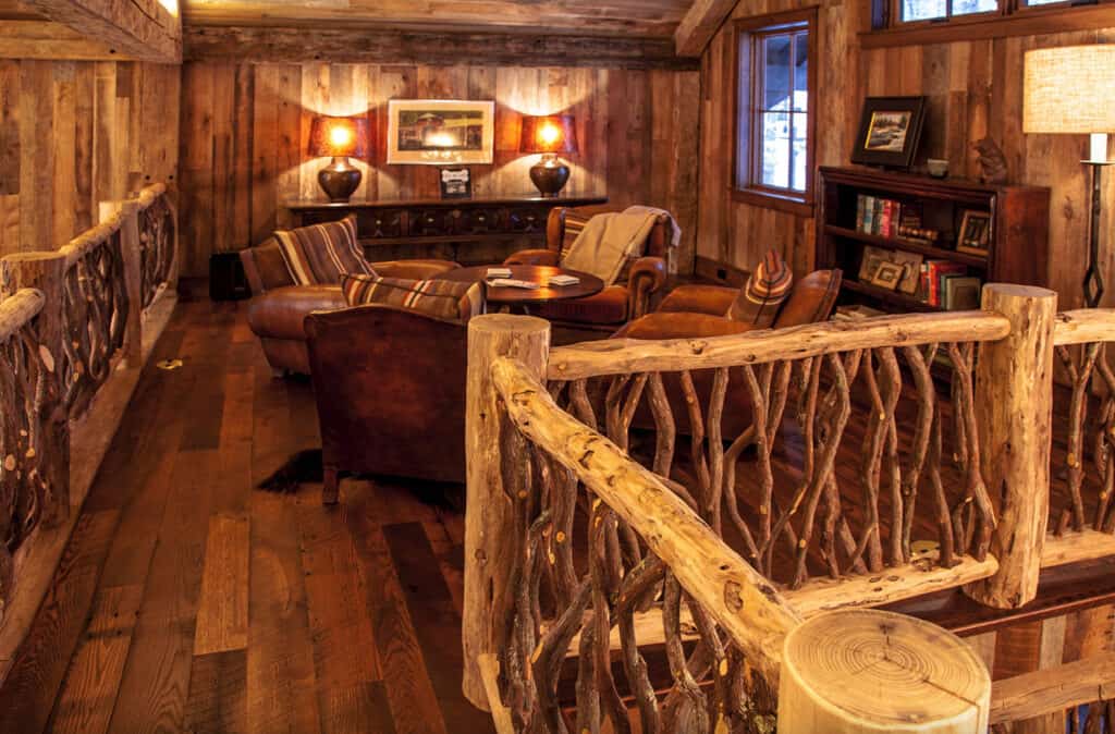 A beautiful Adirondack lodge in New Hampshire with a snowy backdrop