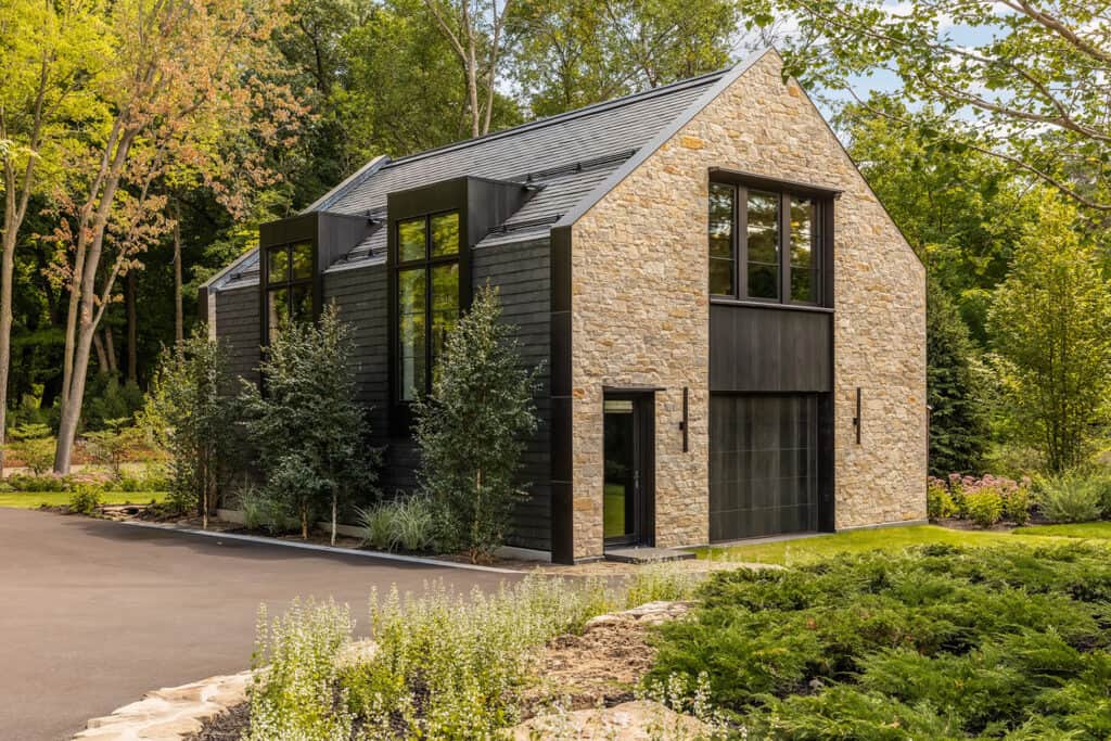 A remarkable stone and glass cottage in harmony with Lake Minnetonka