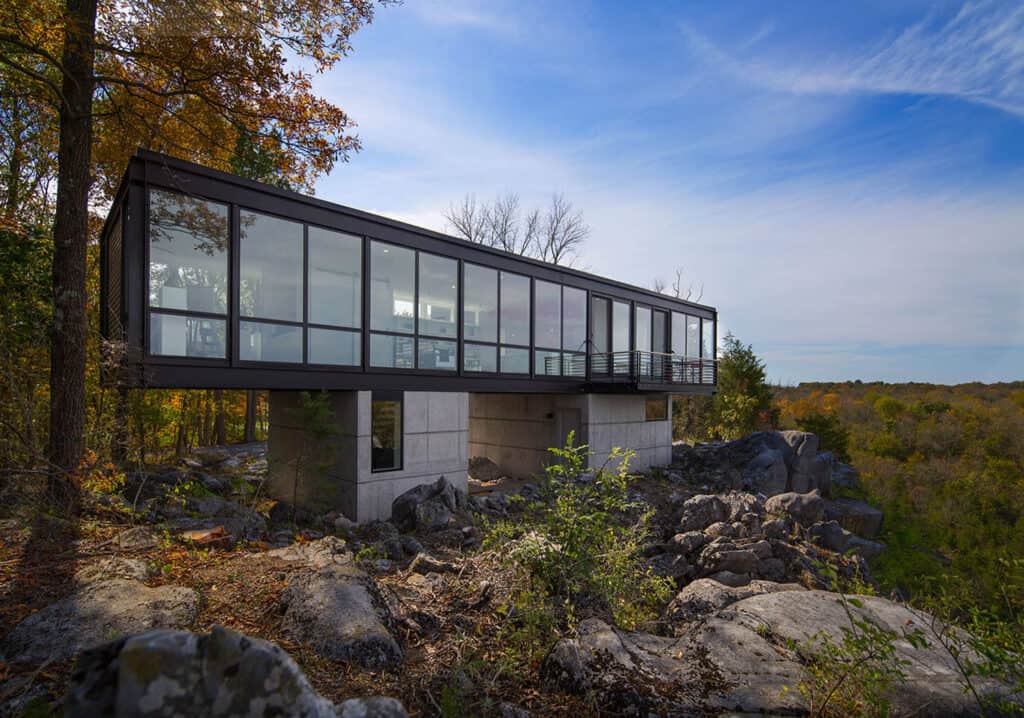 An amazing steel and glass house perched above the Potomac River