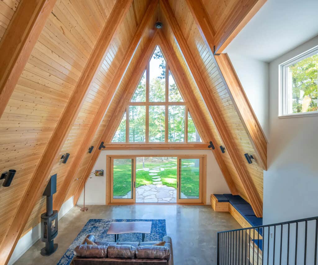 Explore this spectacular A-frame cabin on Lake Placid in a tranquil forest