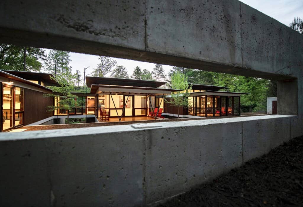 A sustainable retirement house in Georgia cantilevers out to a tree canopy