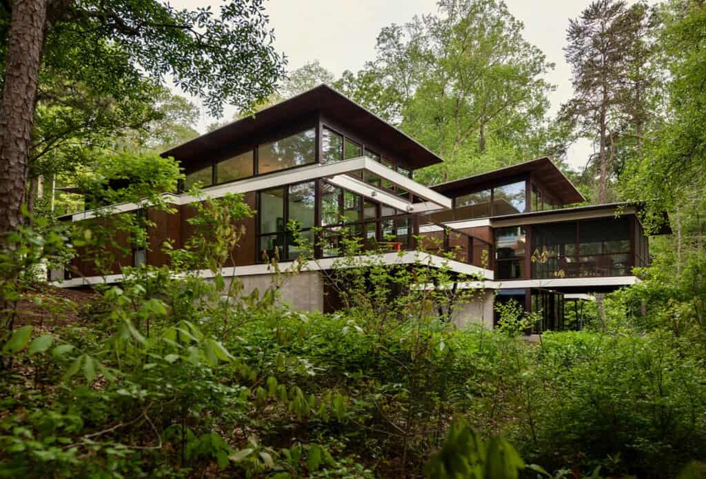 A sustainable retirement house in Georgia cantilevers out to a tree canopy