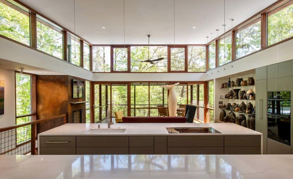 A sustainable retirement house in Georgia cantilevers out to a tree canopy