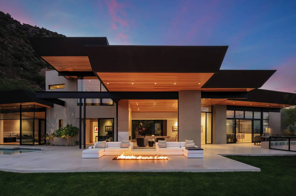 This impressive modern house opens to the Arizona desert landscape