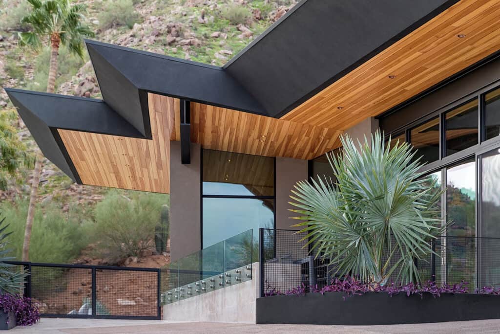 This impressive modern house opens to the Arizona desert landscape