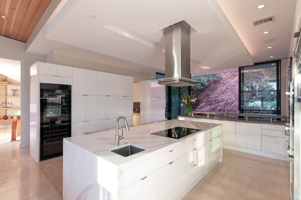 This impressive modern house opens to the Arizona desert landscape