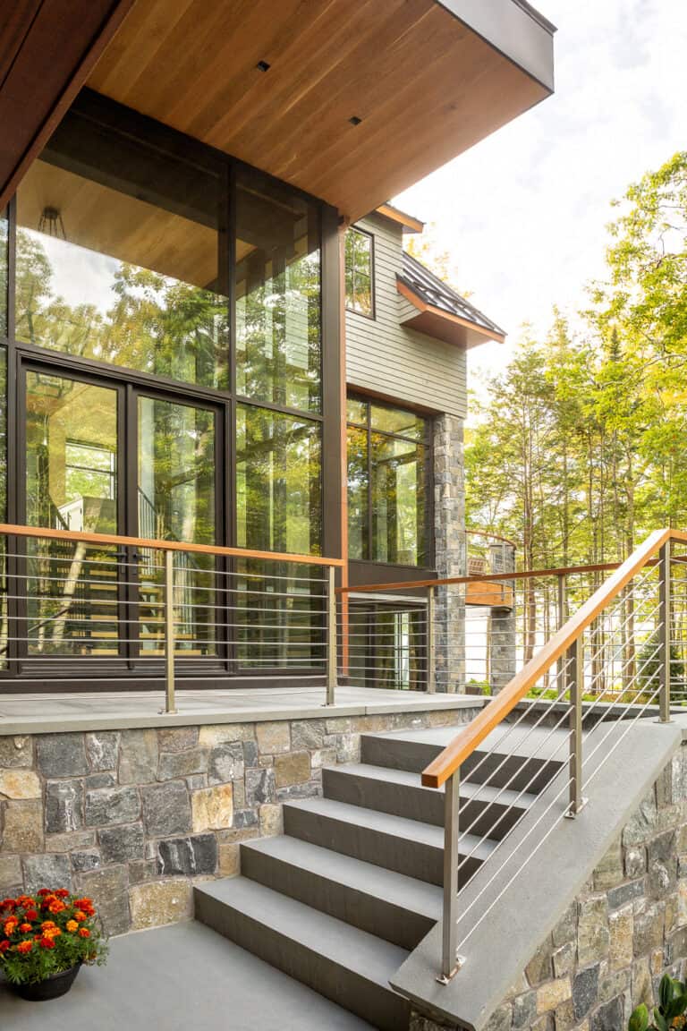 A soothing coastal Maine home in harmony with its wooded setting