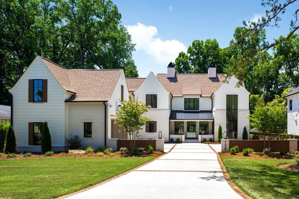 This modern Tudor style home in Charlotte has stunning curb appeal
