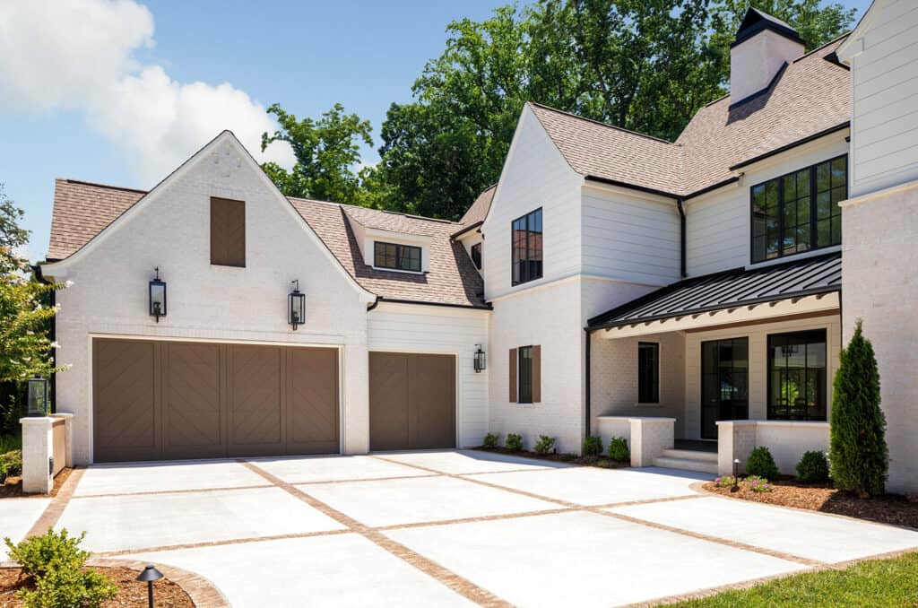 This modern Tudor style home in Charlotte has stunning curb appeal