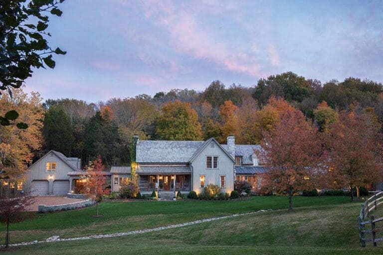 Charming historic farmhouse in Tennessee with a peaceful forest backdrop